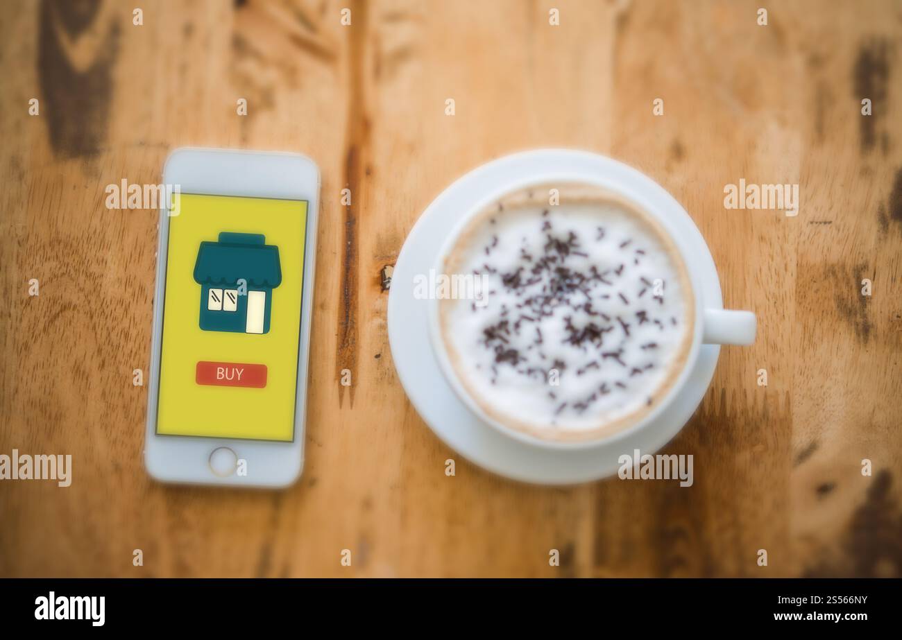 Smart phone online shopping. Desk with coffee in background. Buy stuff ...