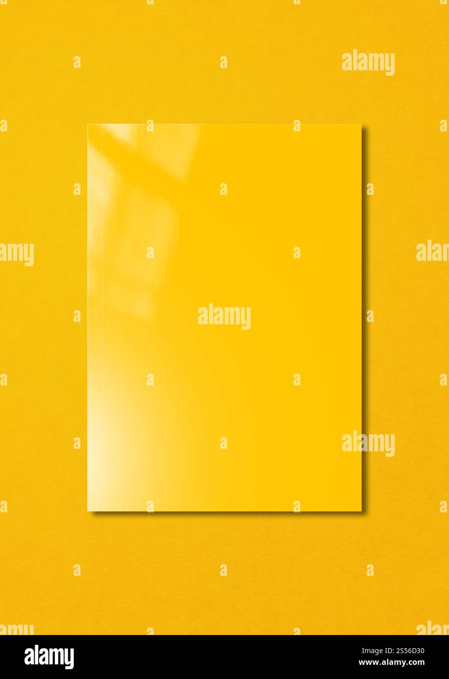 Yellow booklet cover isolated on colorful background, mockup template ...