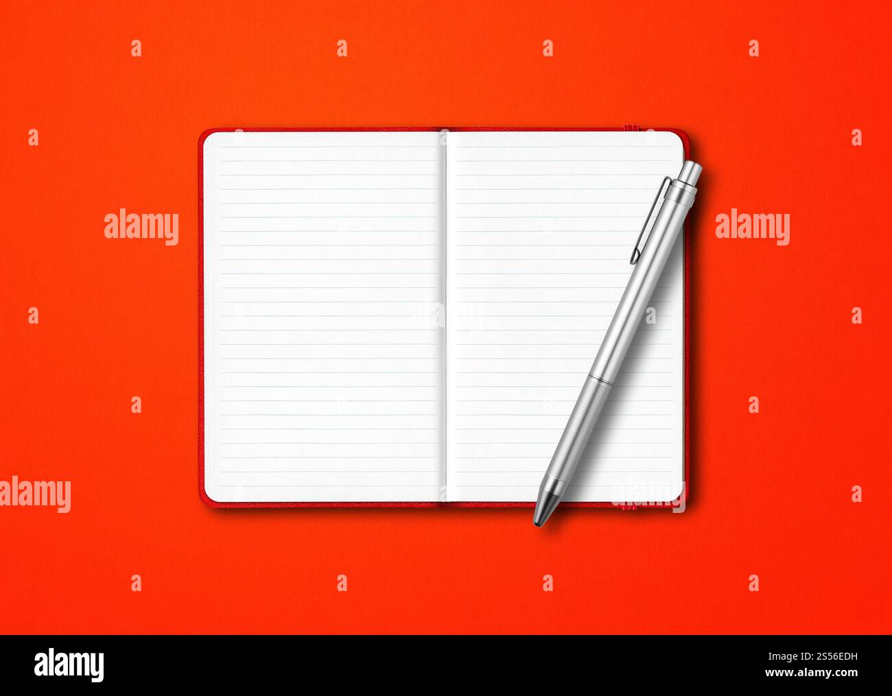 Red open lined notebook mockup with a pen isolated on colorful ...