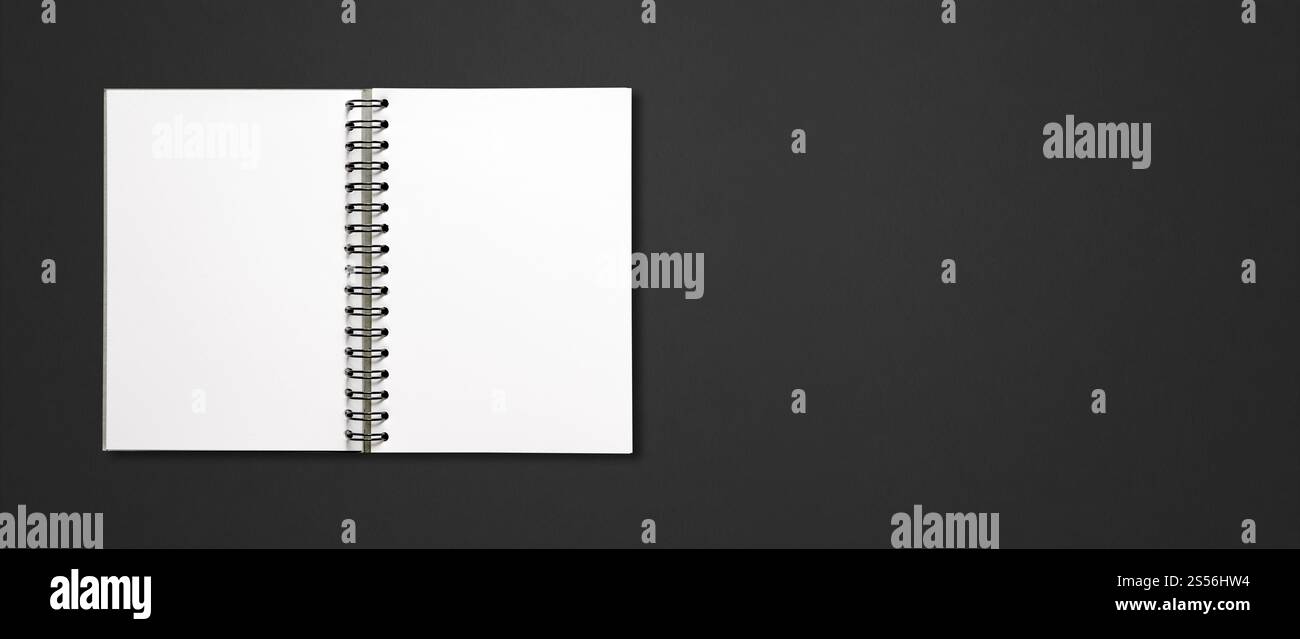 Blank open spiral notebook mockup isolated on black horizontal banner ...