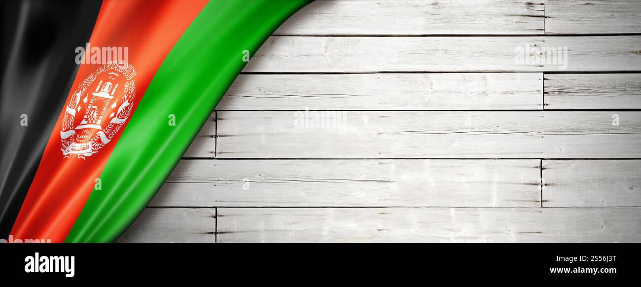 Afghanistan flag on old white wall. Horizontal panoramic banner. Afghan ...