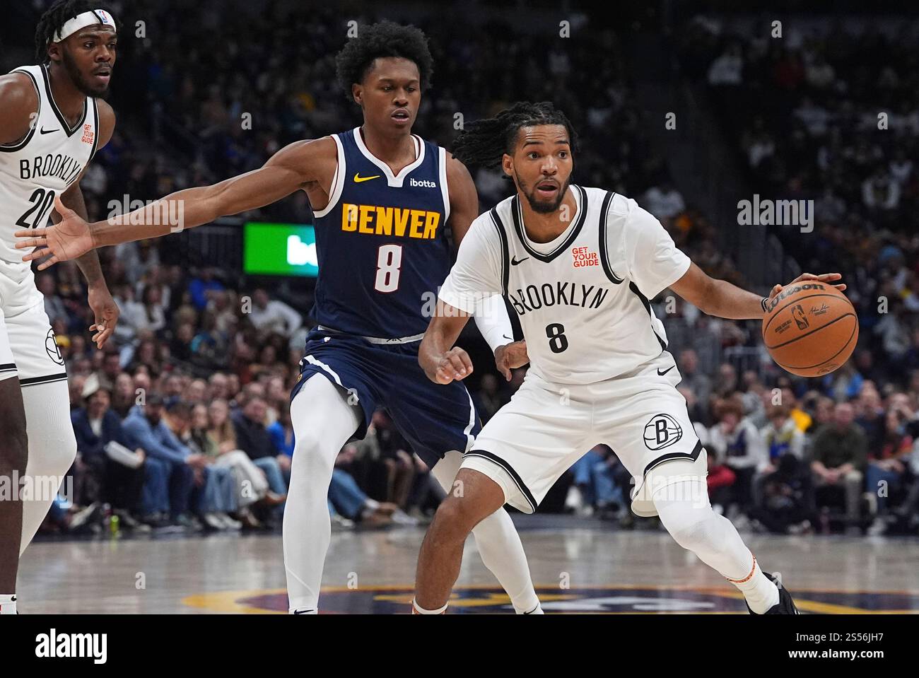 Denver Nuggets forward Peyton Watson (8) covers Brooklyn Nets guard ...