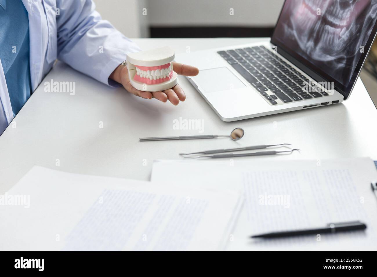 Dentist examining a patient teeth medical treatment at dental clinic ...