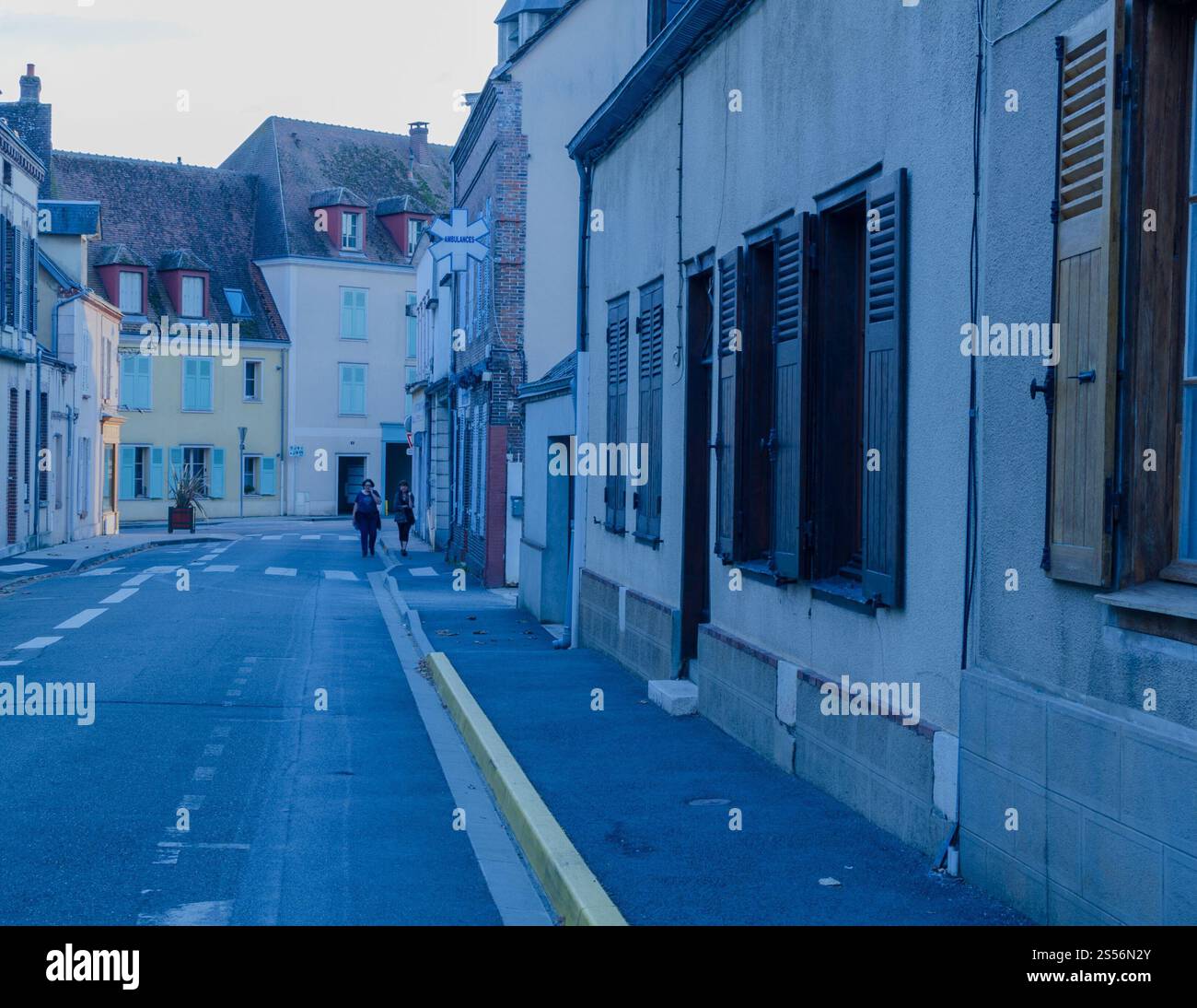 Two local women walk in the village of Illier-Combrary in France. Illiers is on the Veloscenie ...