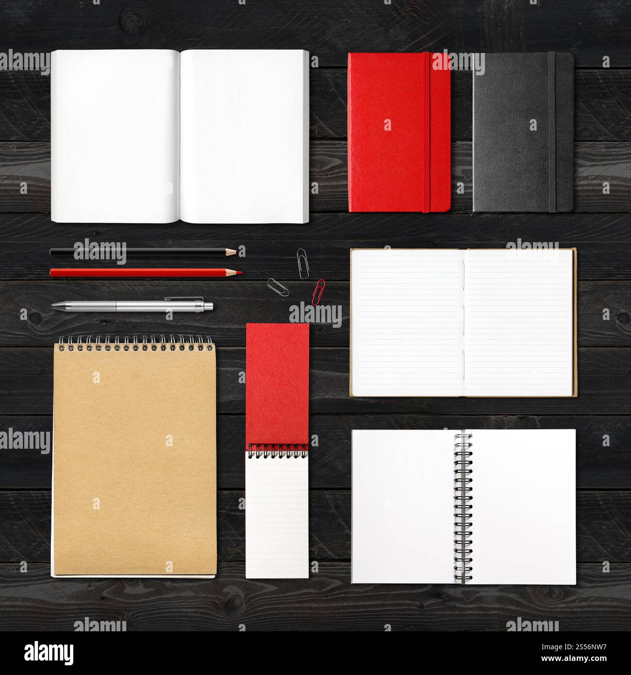 stationery books and notebooks mockup template isolated on black wood ...