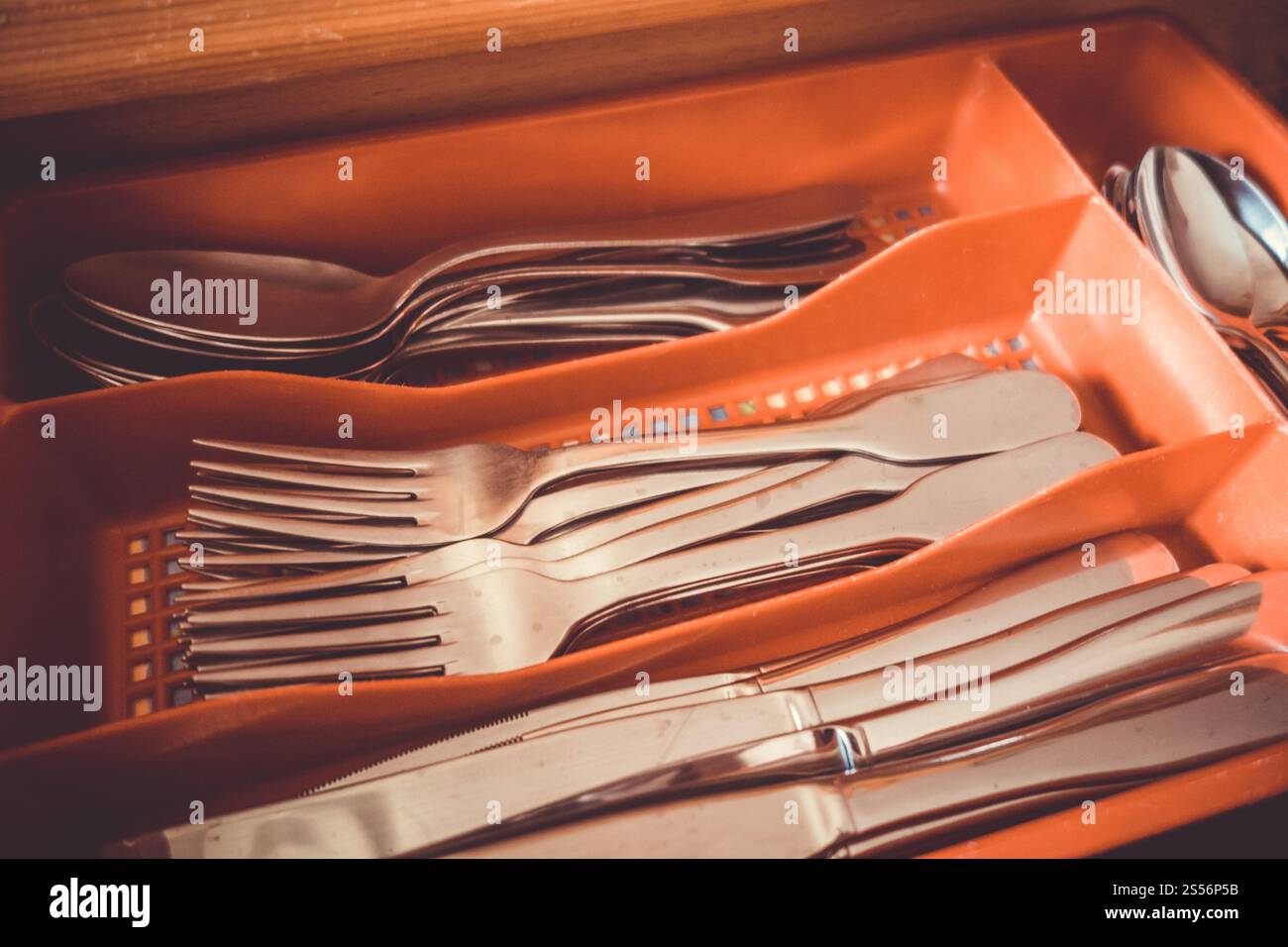 Cutlery in a kitchen drawer. Closeup view. Cutlery in a drawer Stock ...