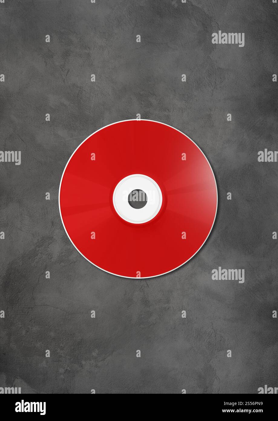 Red CD - DVD label mockup template isolated on concrete background. Red ...