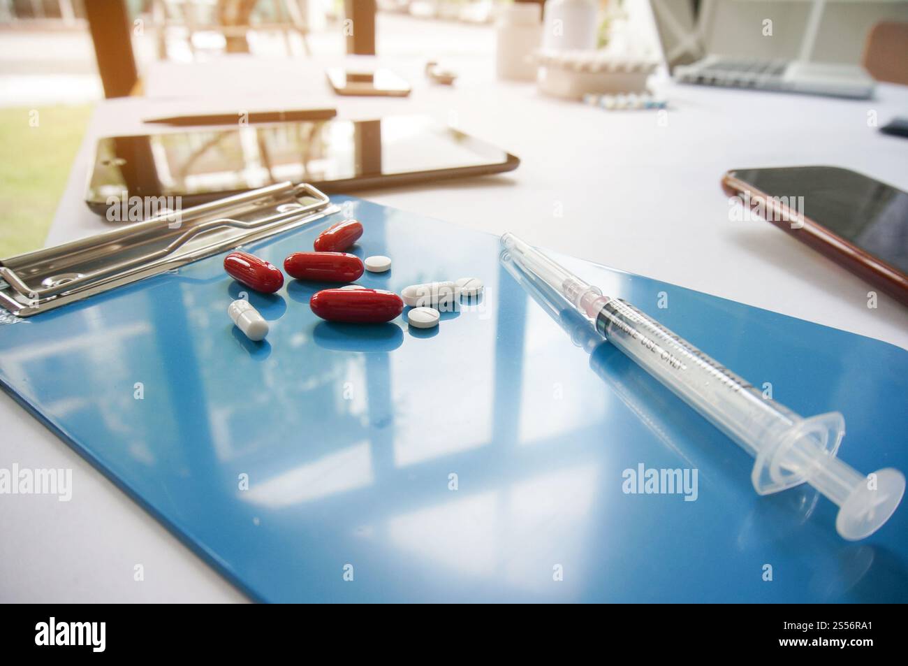 Medicine Doctor hand holding pack of different tablet blisters for ...