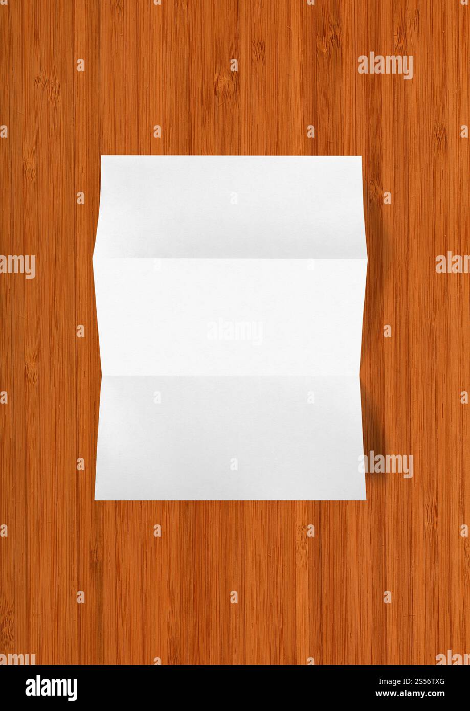 Blank folded White A4 paper sheet mockup template isolated on dark ...