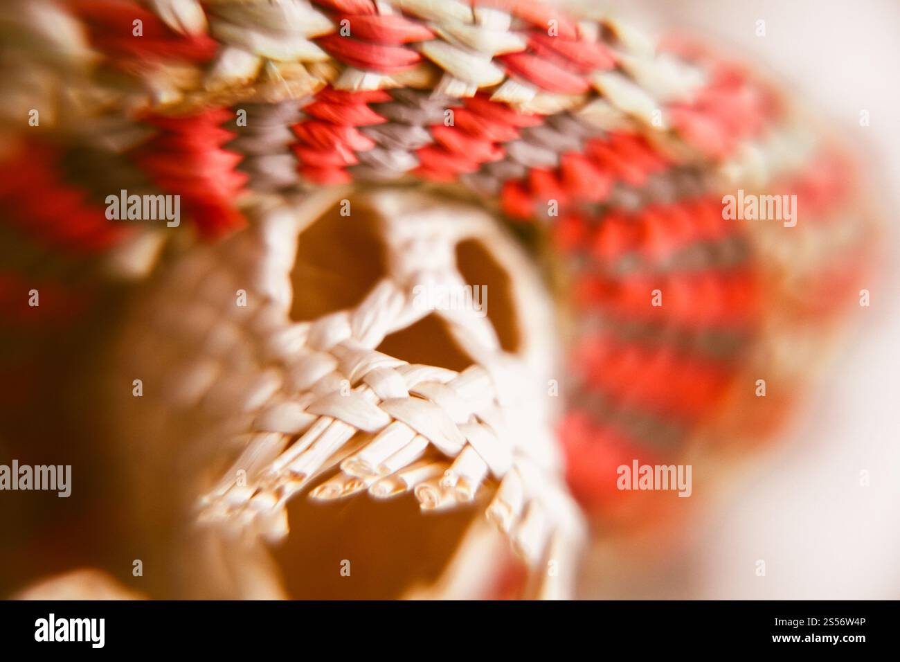 Braided skeleton doll macro view. Detail closeup background. Braided ...