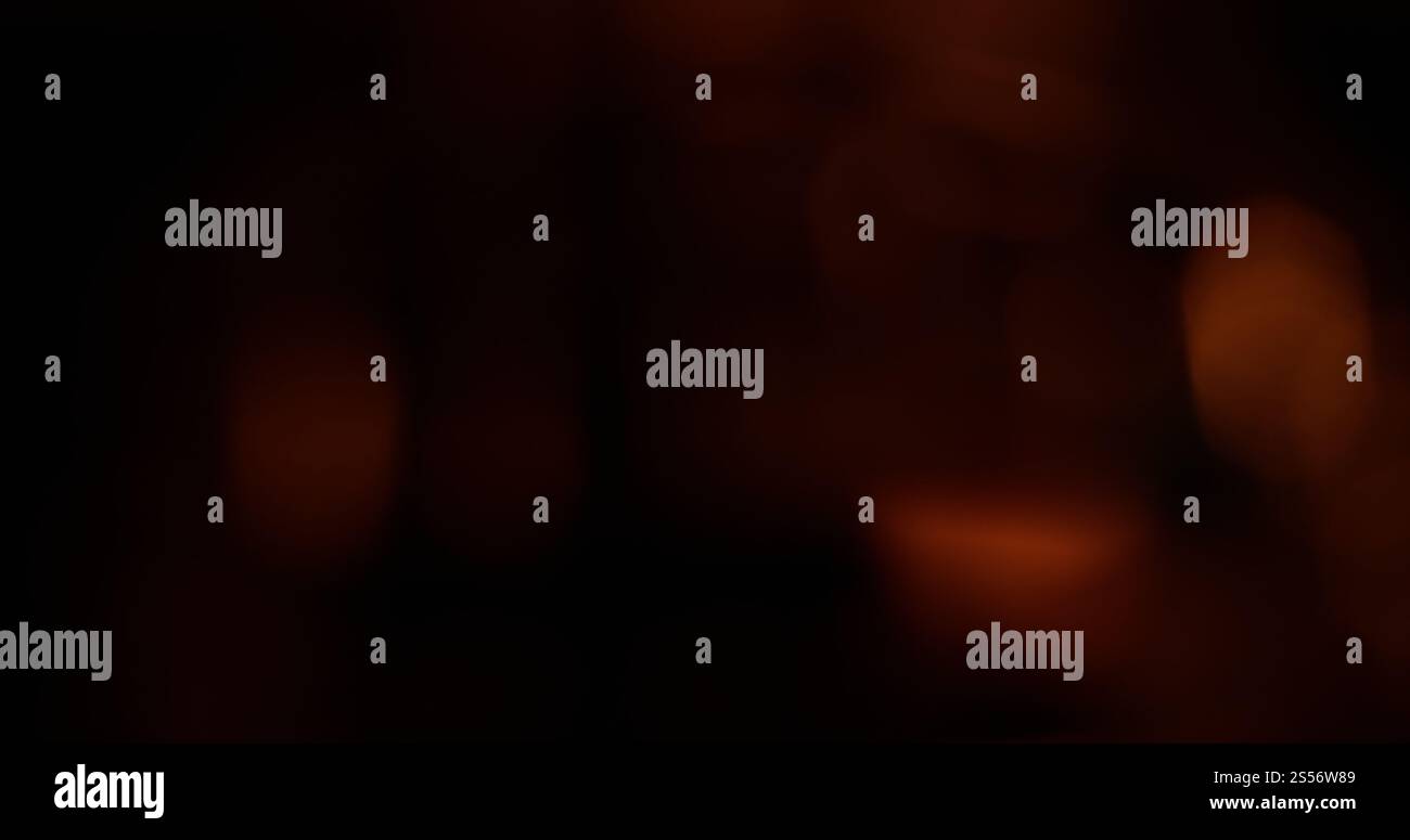 Bokeh warm shade. Glowing spots. Appearance flash rhyme. Disappearance ...