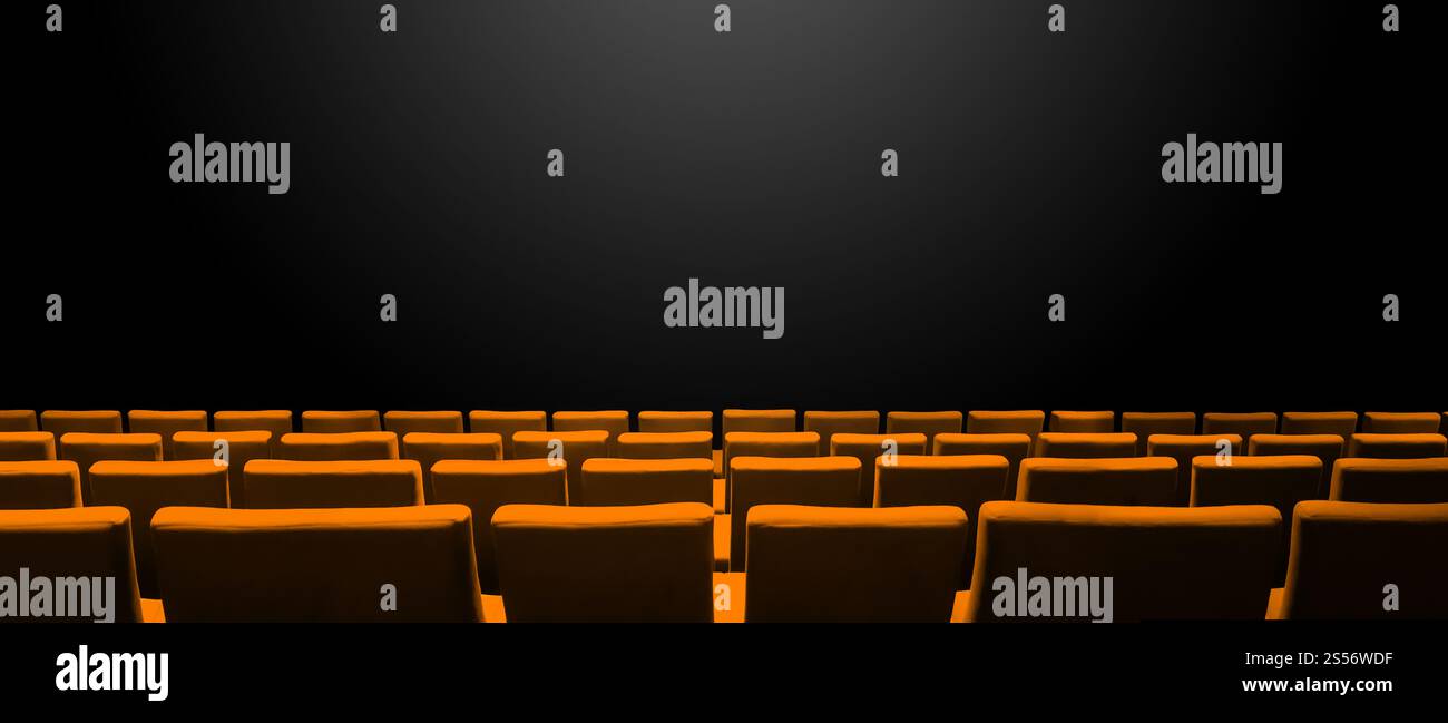 Cinema movie theatre with orange seats rows and a black copy space ...