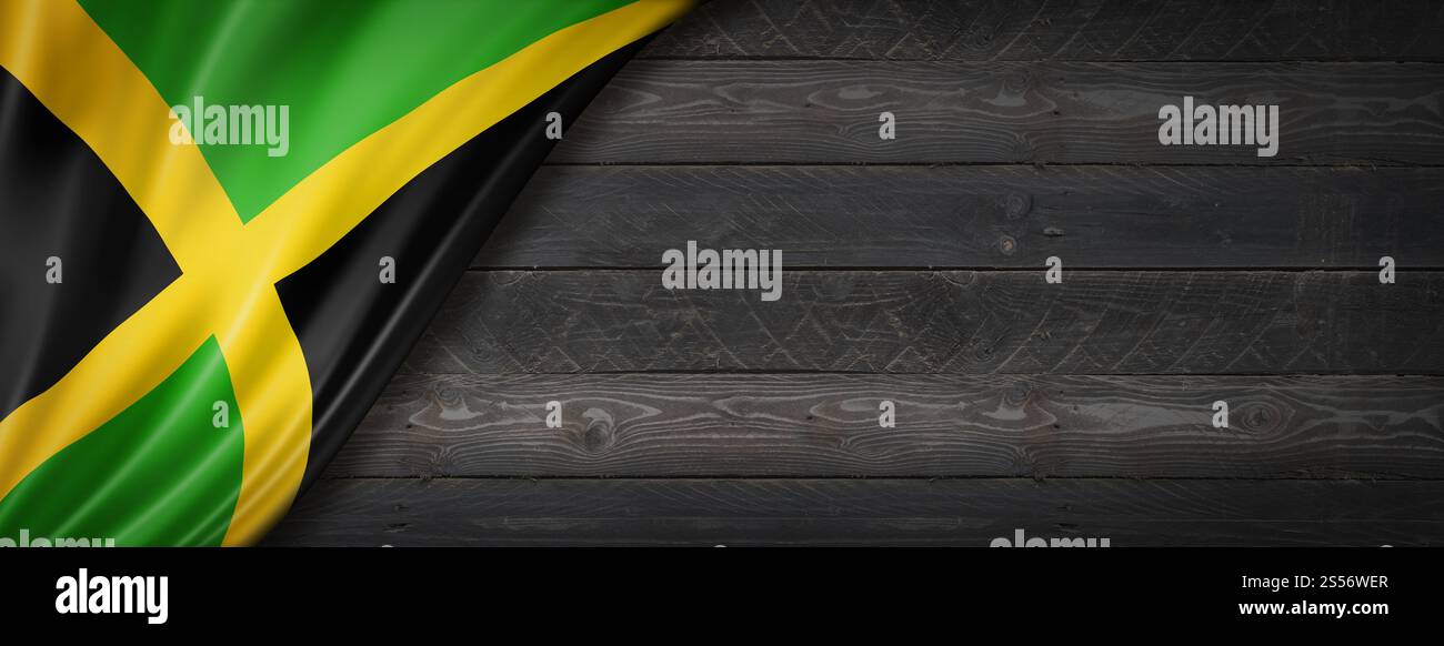 Jamaica flag on black wood wall. Horizontal panoramic banner. Jamaican ...