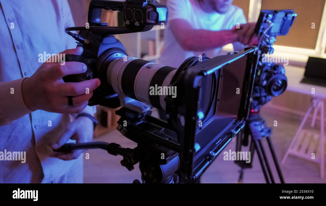 Cameraman hand. Video studio. Unrecognizable male operator work with ...