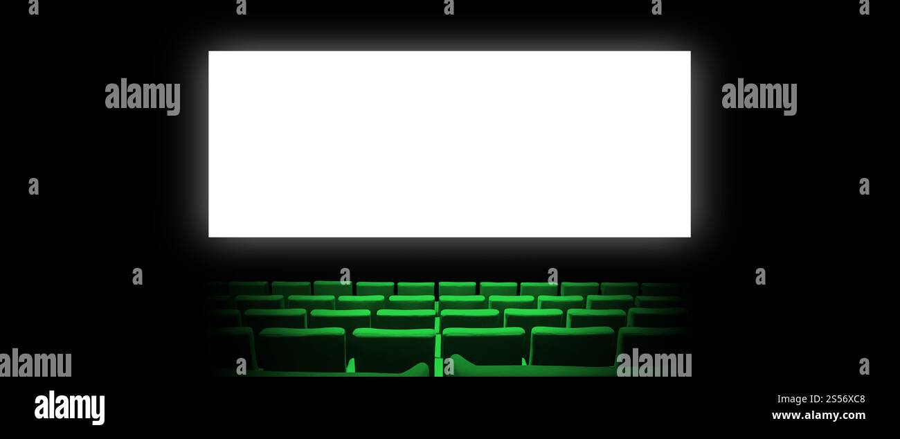 Cinema movie theatre with green velvet seats and a blank white screen ...