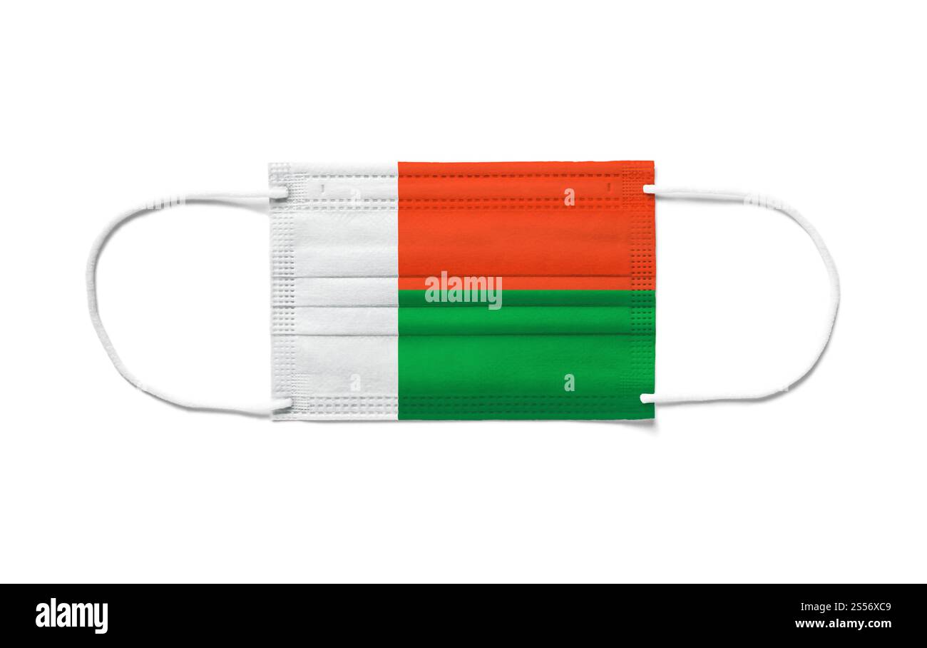 Flag of Madagascar on a disposable surgical mask. White background ...