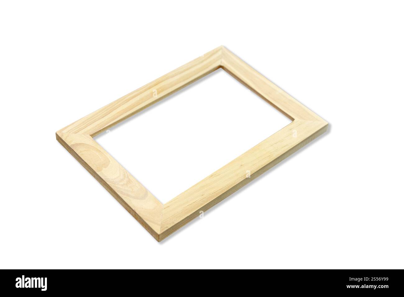 Wooden picture frame hanging on a white wall. Blank mockup template ...