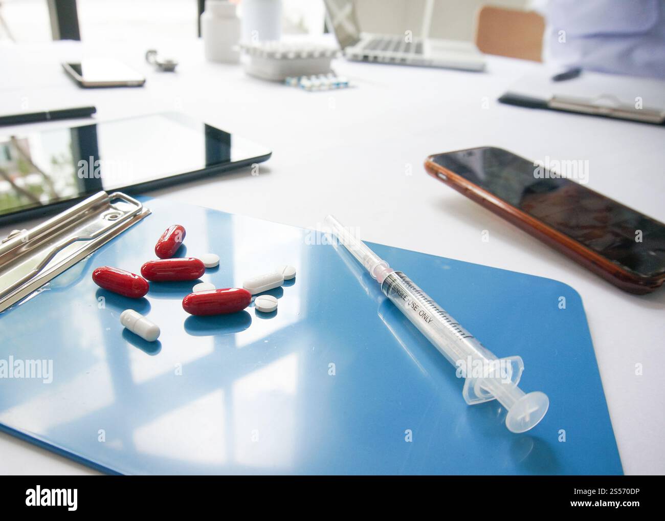 Medicine Doctor hand holding pack of different tablet blisters for ...