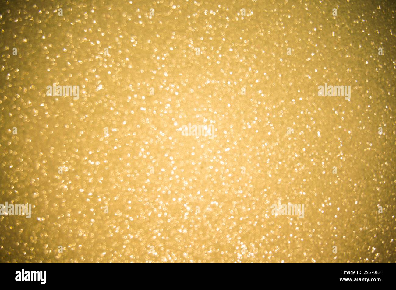 Gold glitters background. shimmering blur spot lights Bokeh Shiny gold ...