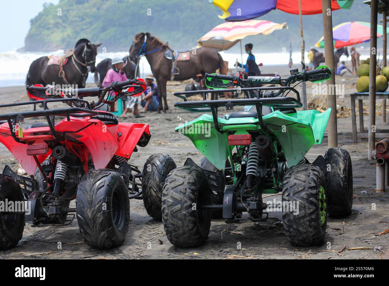 Atv on the beach seaside Stock Photo - Alamy