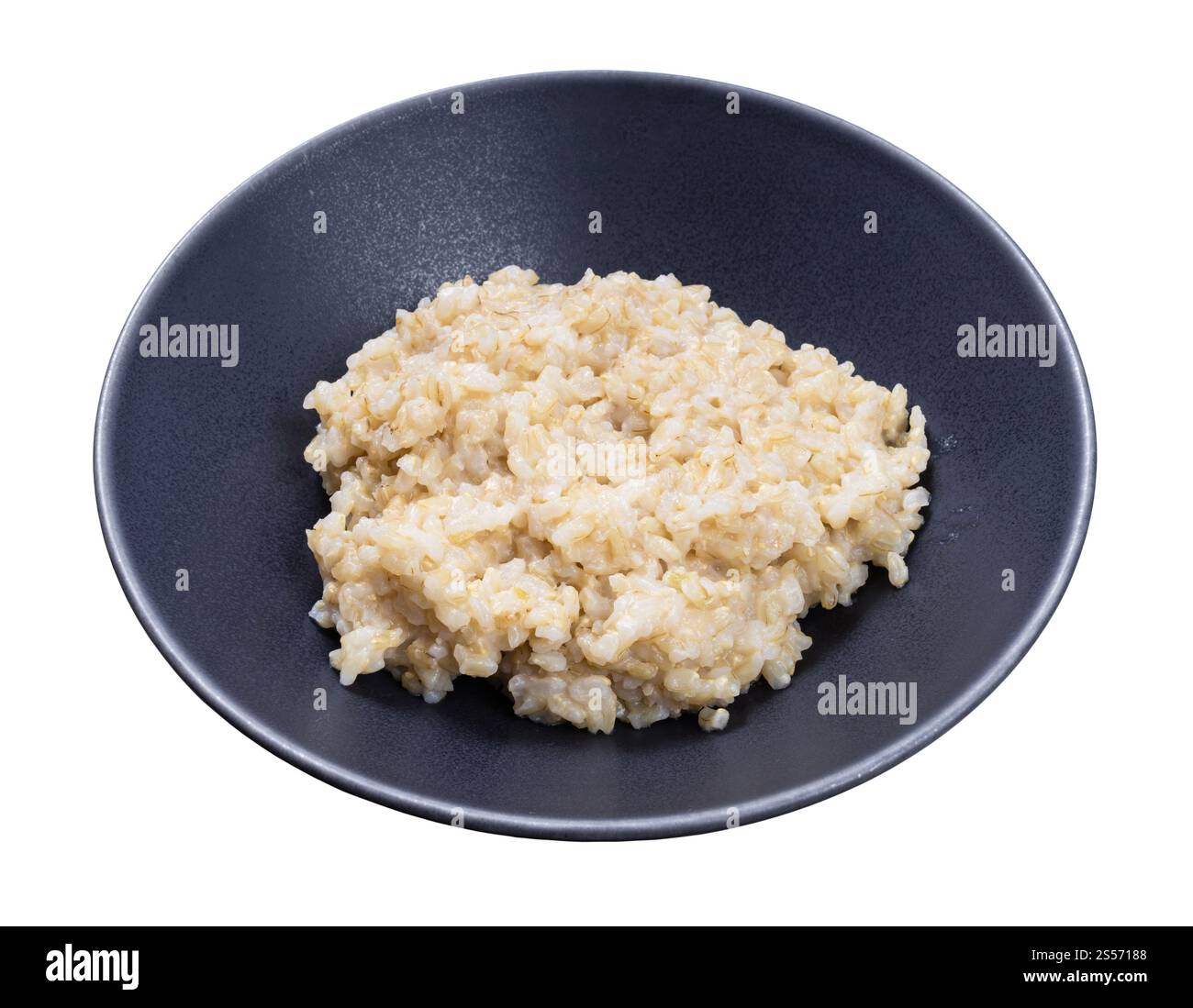 porridge from brown rice in gray bowl isolated on white background ...