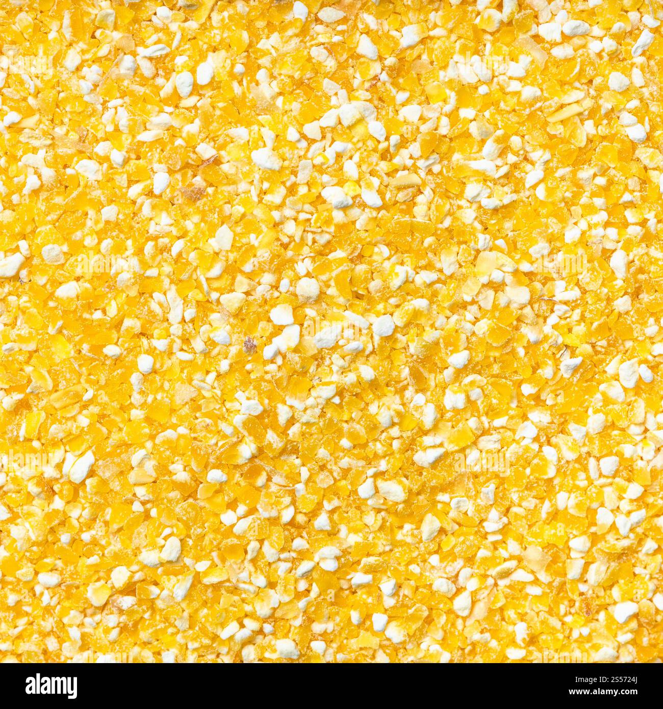 square food background - uncooked coarse cornmeal close up Stock Photo ...