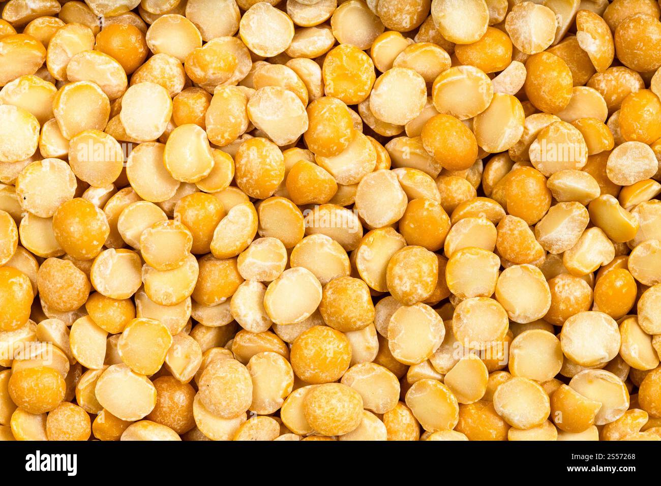 food background - raw dried split yellow peas Stock Photo - Alamy