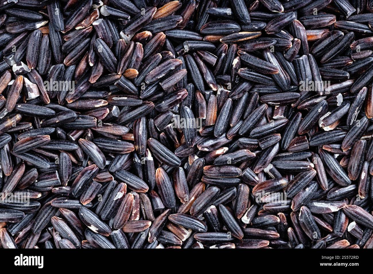 food background - many raw black rice grains close up Stock Photo - Alamy