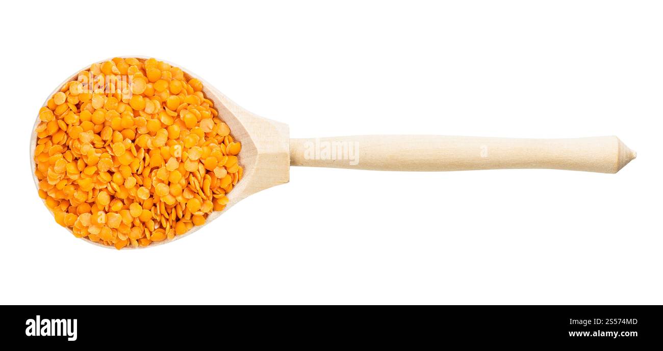 top view of wood spoon with split red lentils isolated on white background Stock Photo - Alamy