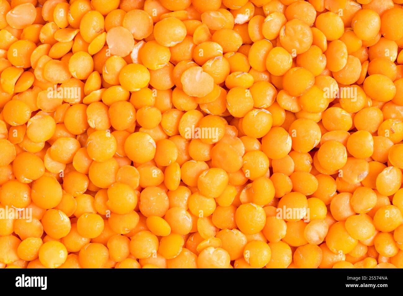 food background - raw whole red lentils Stock Photo - Alamy