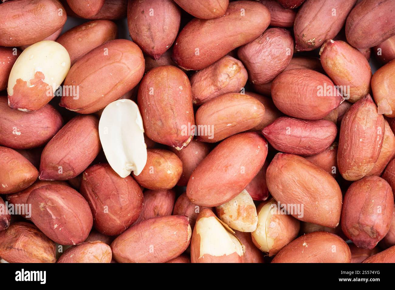 food background - many shelled peanut seeds Stock Photo - Alamy