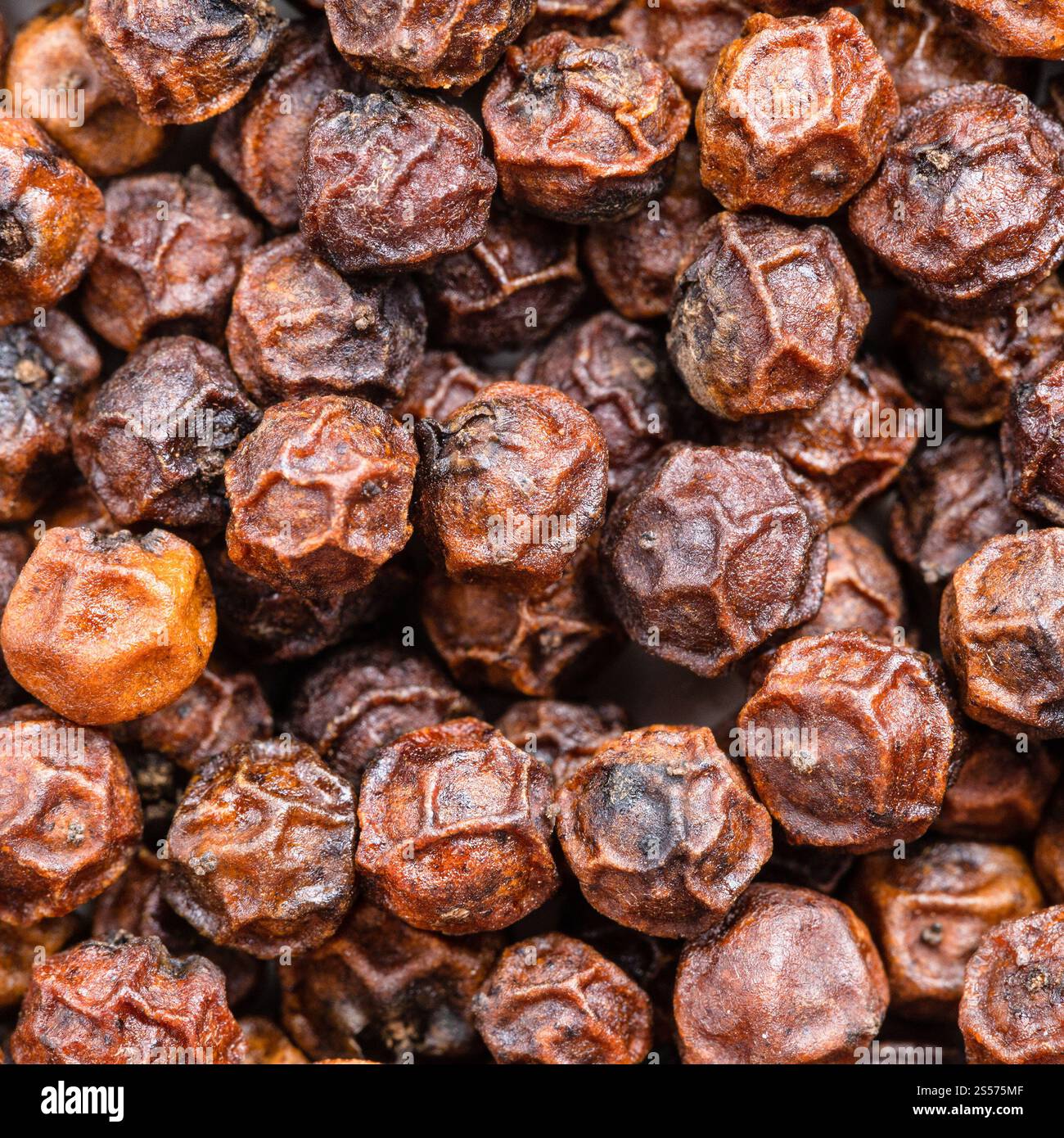 square food background - red kampot pepper close up Stock Photo - Alamy