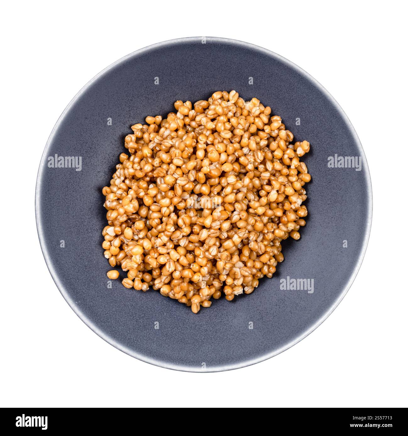 top view of cooked porridge from whole-grain wheat in gray bowl ...