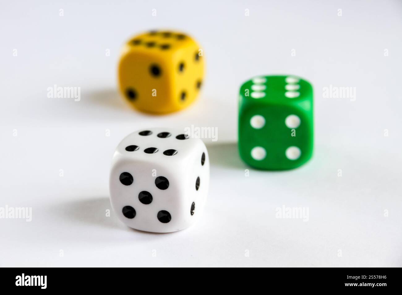 Three colorful dices isolated on white background. Top view. Three ...