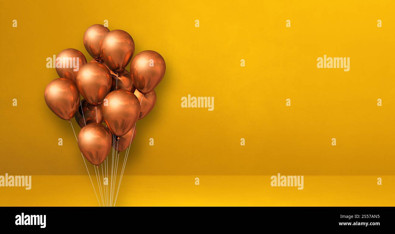 Copper balloons bunch on a yellow wall background. Horizontal banner ...