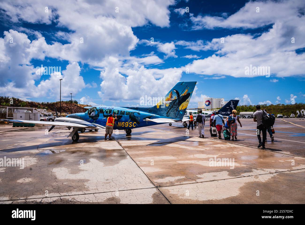 St. Thomas, USVI USA - March 27, 2018: Passengers boarding a Cape Air ...
