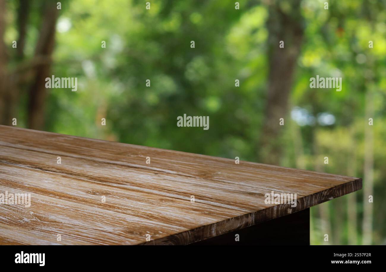 Empty wood table top and blur of out door garden background Empty ...