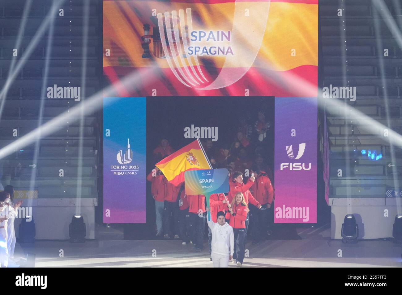 Turin, Italy. 13th Jan, 2025. Spain's athletes parade with their flag ...