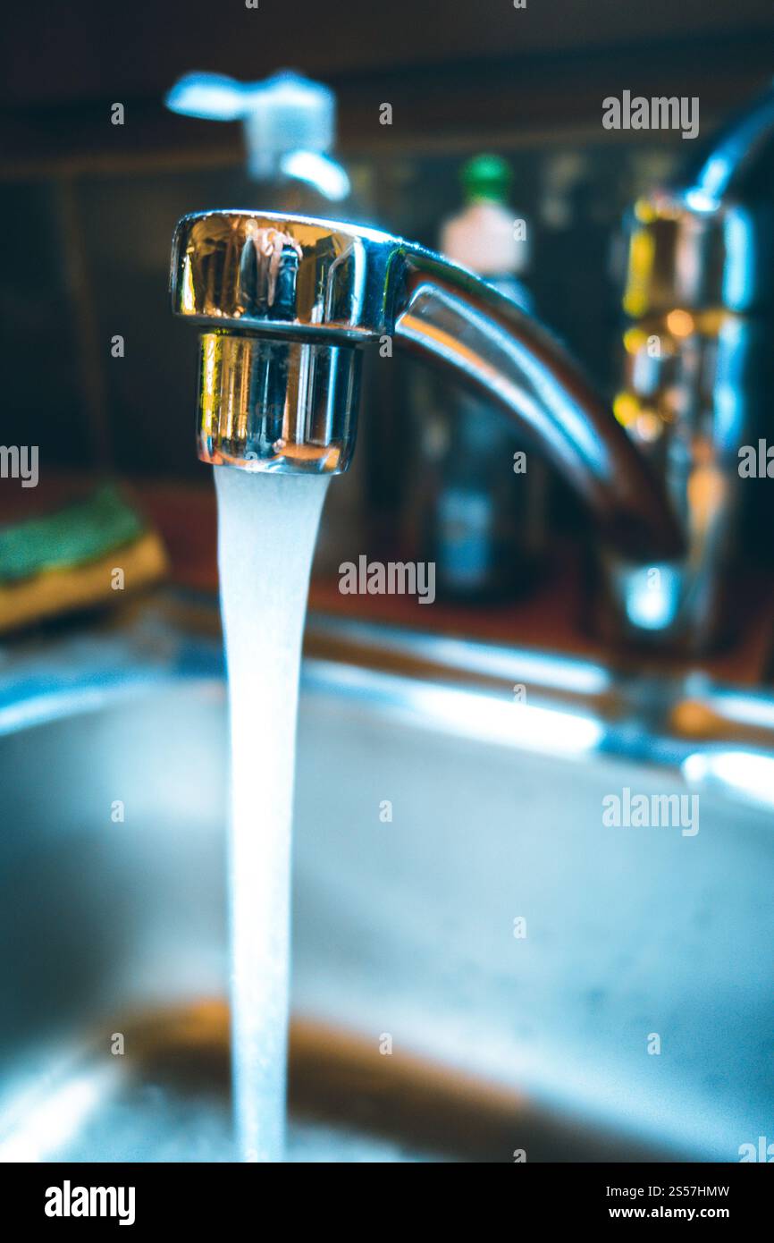 Water tap, faucet, closeup view in a kitchen. Water tap, faucet ...