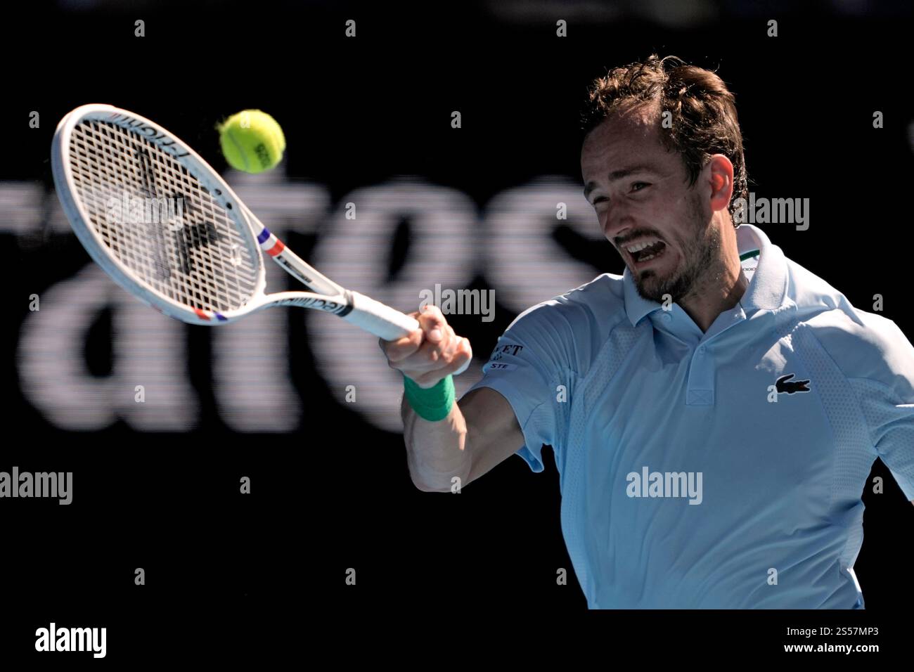 Daniil Medvedev of Russia plays a forehand return to Kasidit Samrej of Thailand during their ...