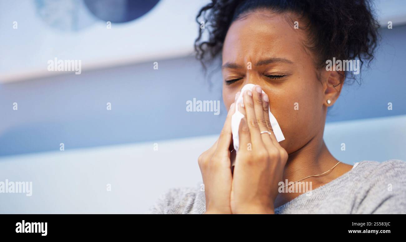 Blowing nose, sneeze and tissue with woman in bedroom of home for ...