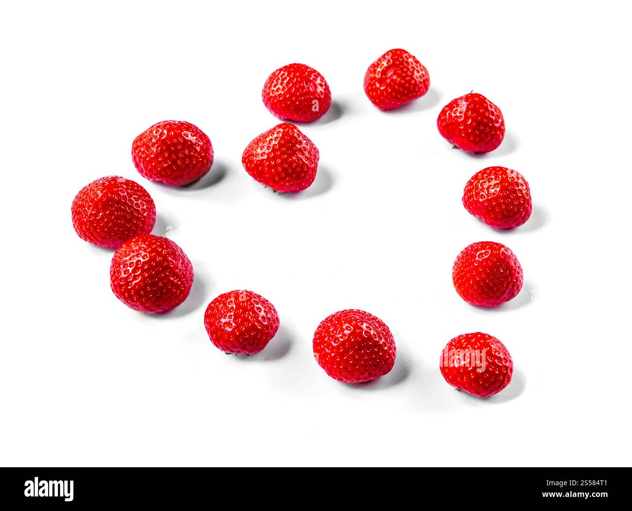 Heart shape made of strawberries. Isolated on white background. Heart ...
