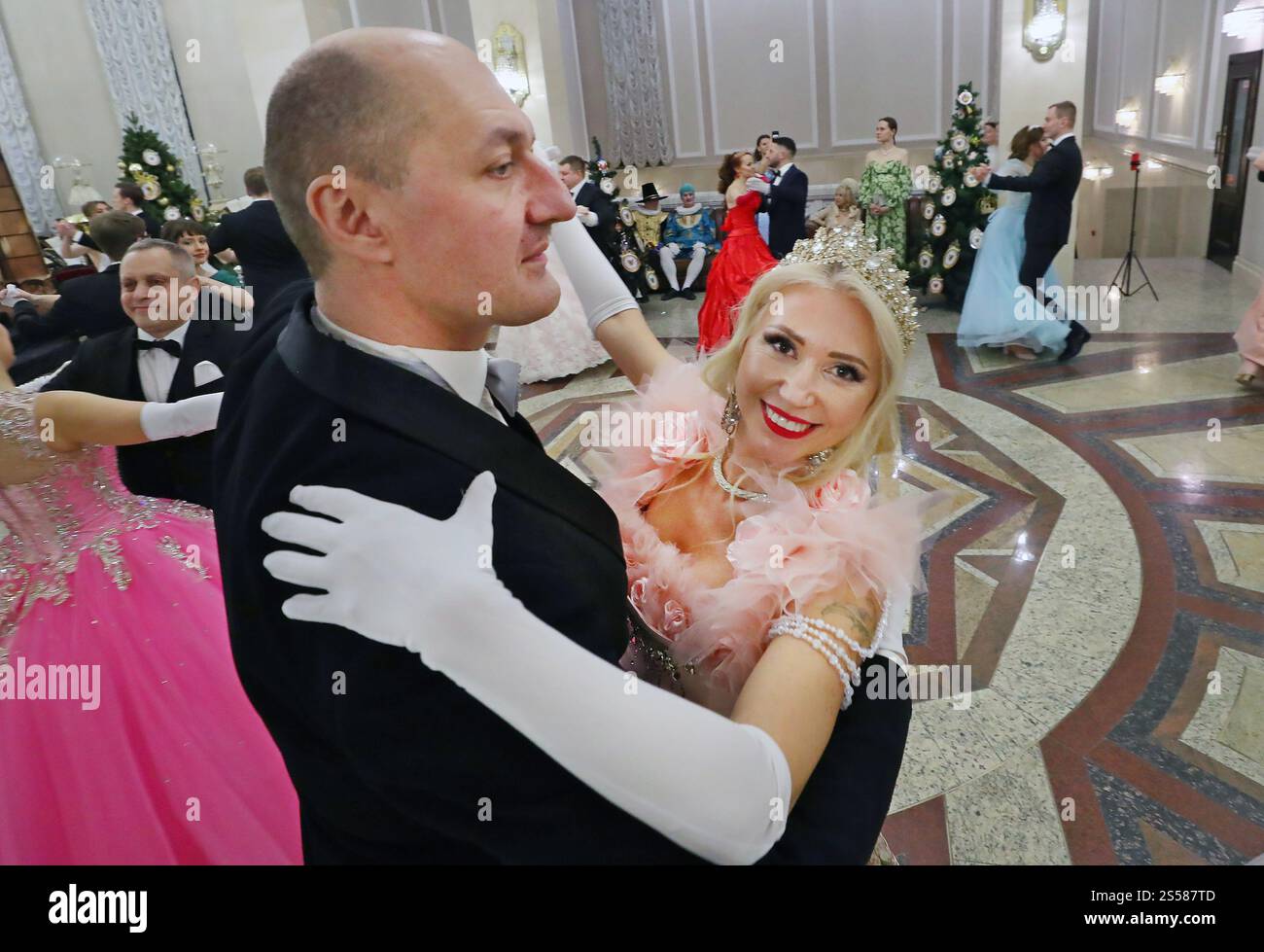 Minsk. 13th Jan, 2025. People dressed in festive costumes attend a ball ...