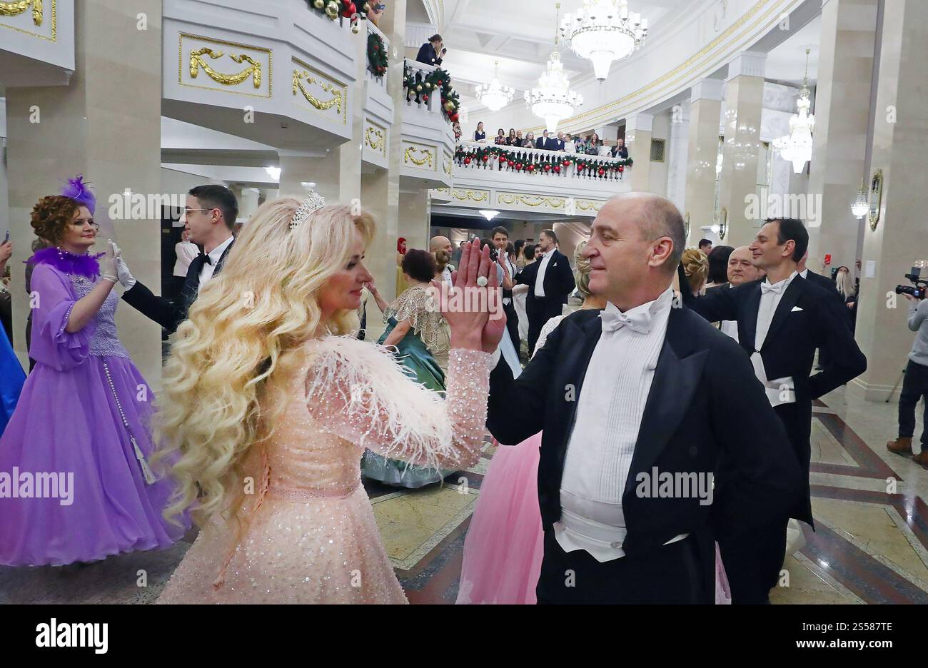 Minsk. 13th Jan, 2025. People dressed in festive costumes attend a ball ...