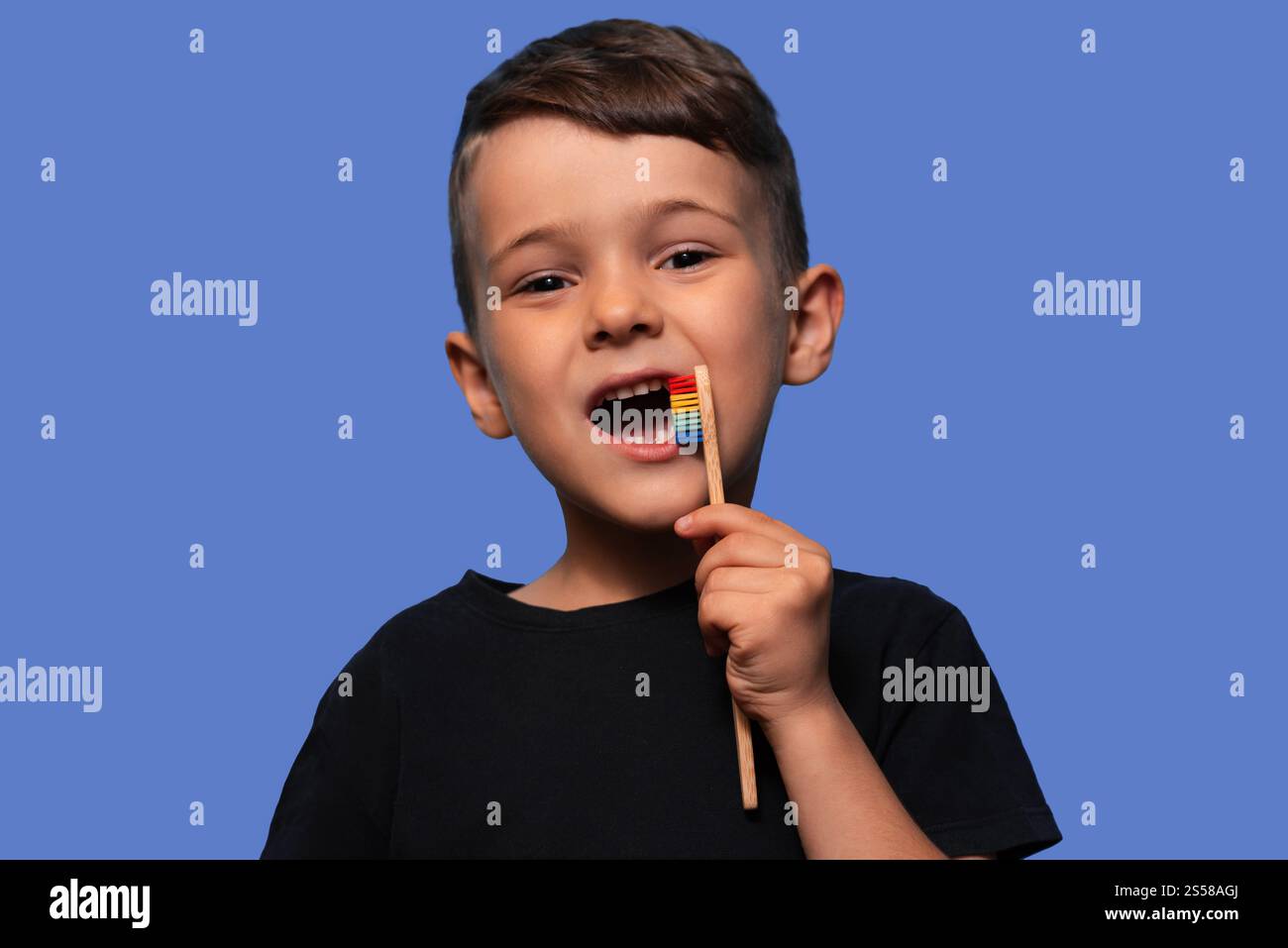 A cute boy with no front teeth. With a toothbrush in hand. Dental ...