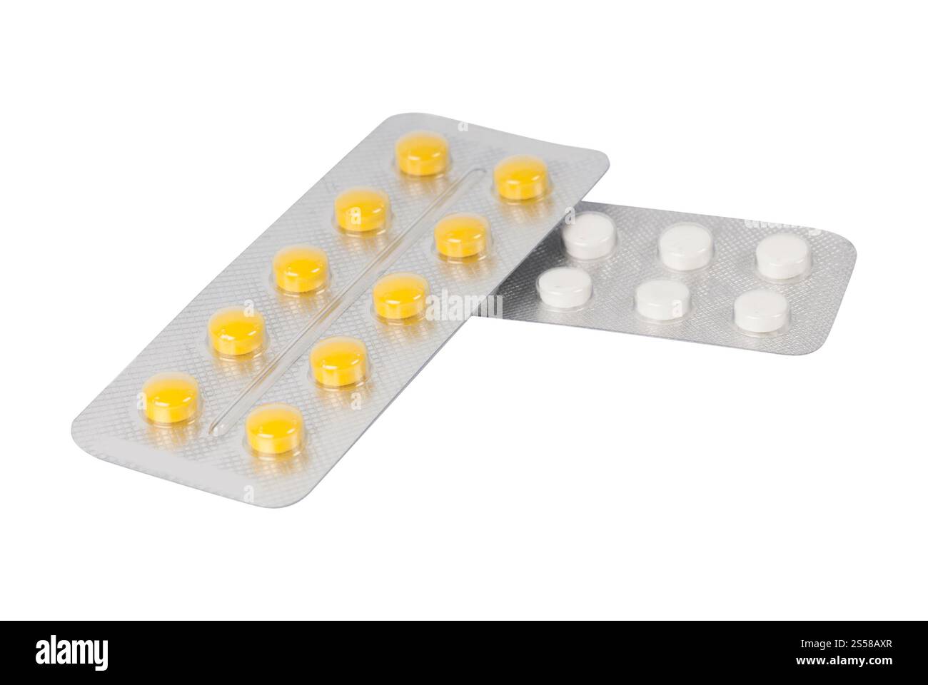 white and yellow pils tablets in blister pack Stock Photo - Alamy