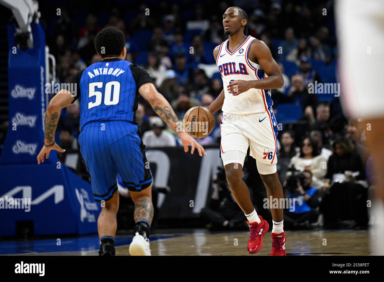Philadelphia 76ers guard Tyrese Maxey (0) is defended by Orlando Magic ...