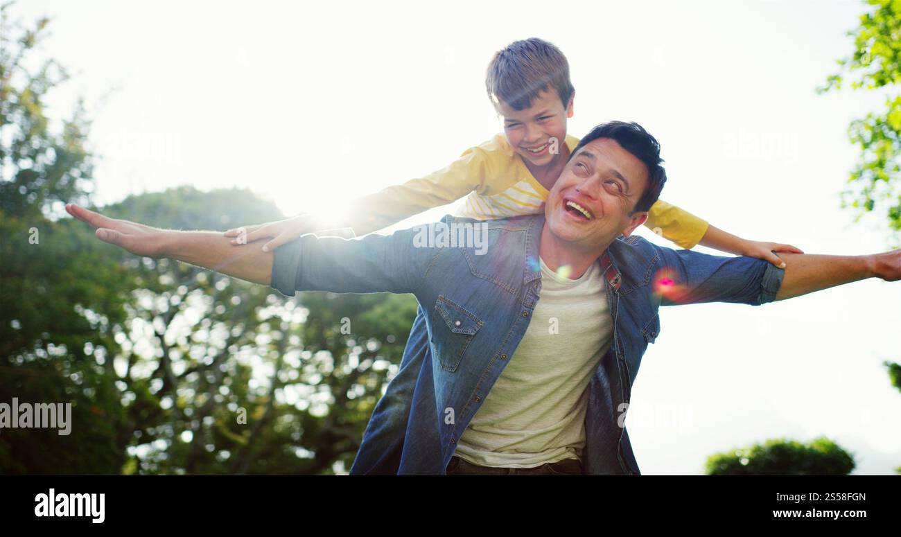 Father, piggyback and outdoor flying with son, fantasy adventure and ...