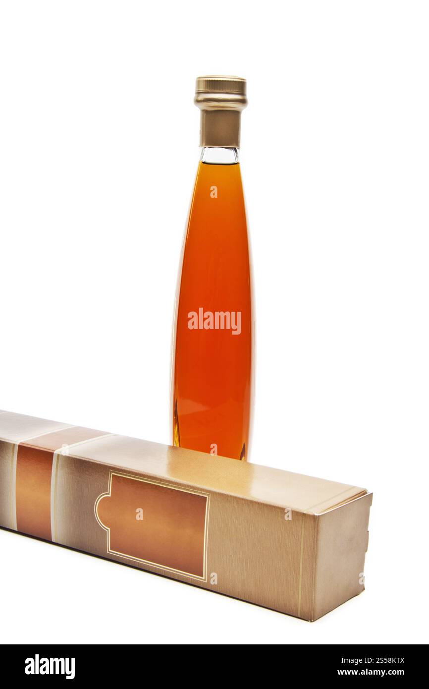 Cognac in bottle without labels isolated on white background. Cognac in ...