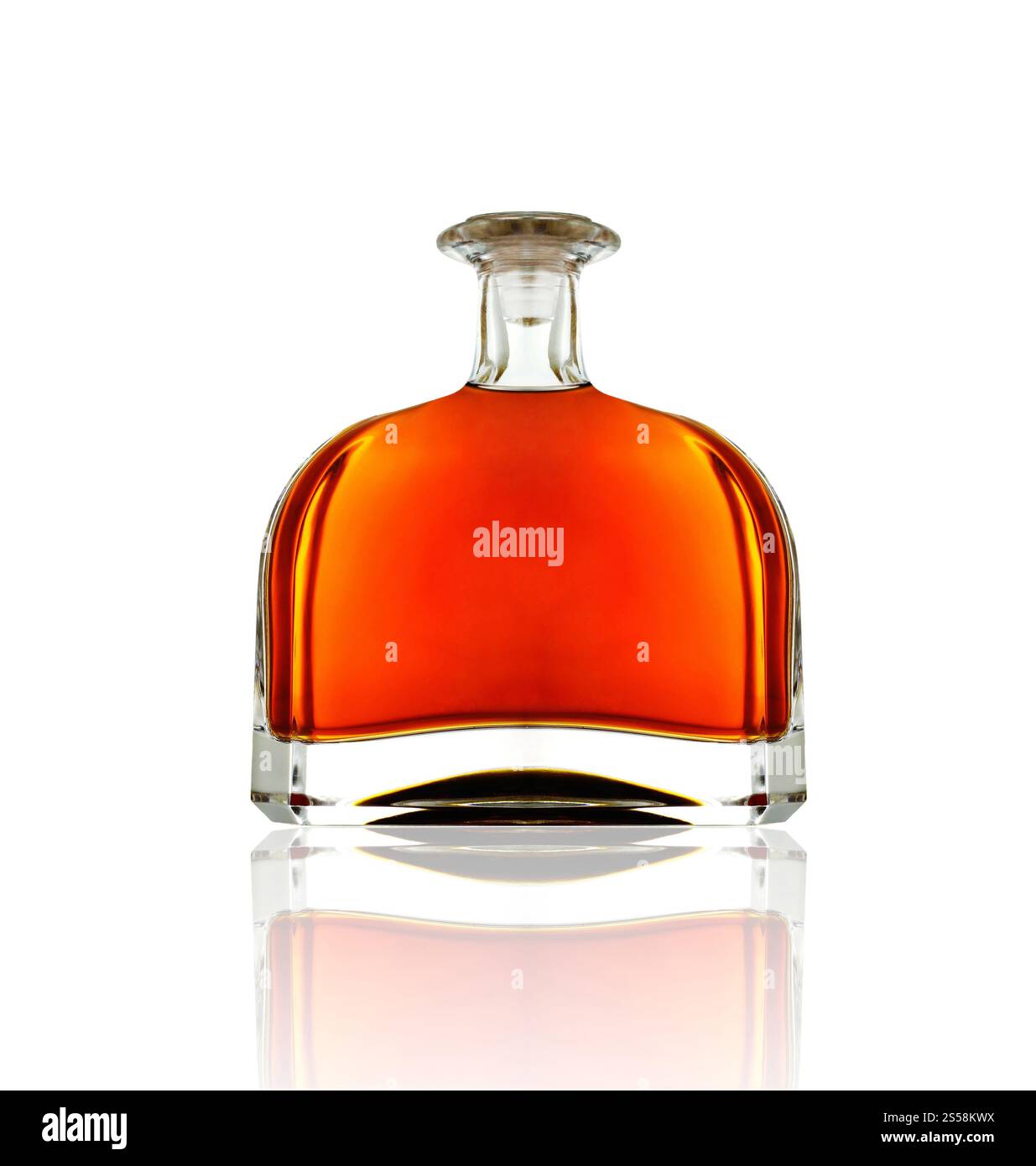 Cognac in bottle without labels isolated on a white background. Cognac in bottle without labels ...
